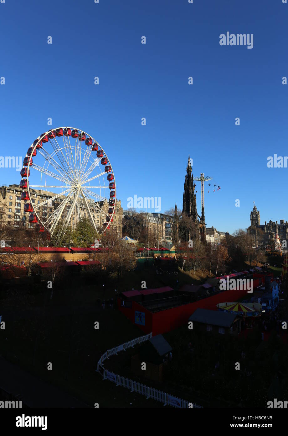 Ferris wheel, Scott Monument and Star Flyer ride Edinburgh Scotland ...