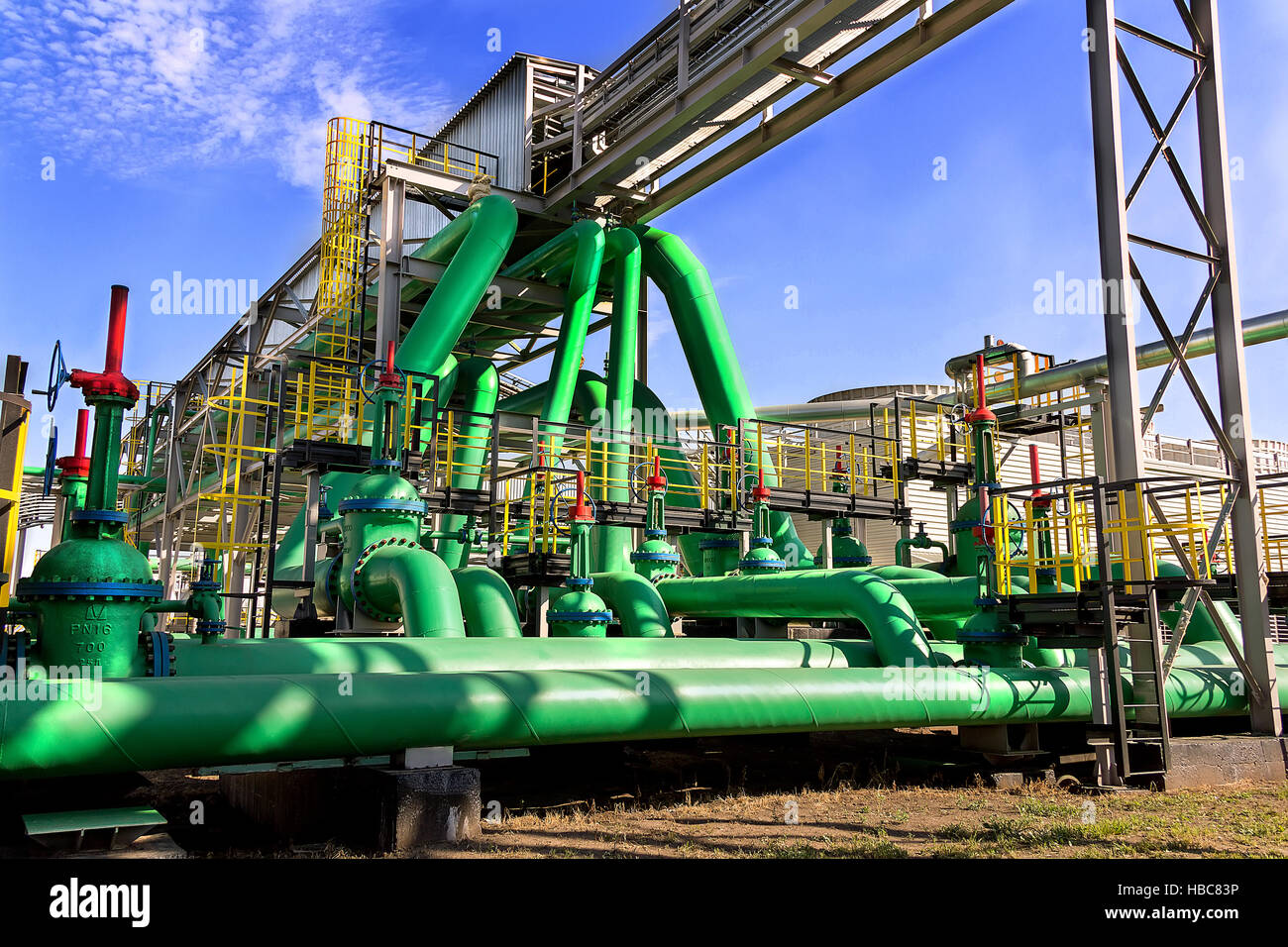 Industrial green tube on plant Stock Photo - Alamy