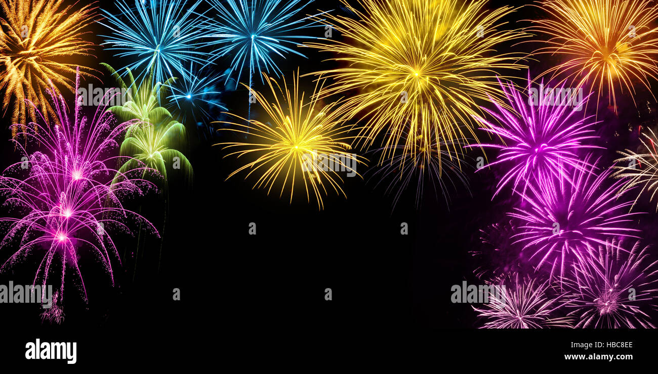 Gorgeous multi-colored fireworks on black background with copy space ...