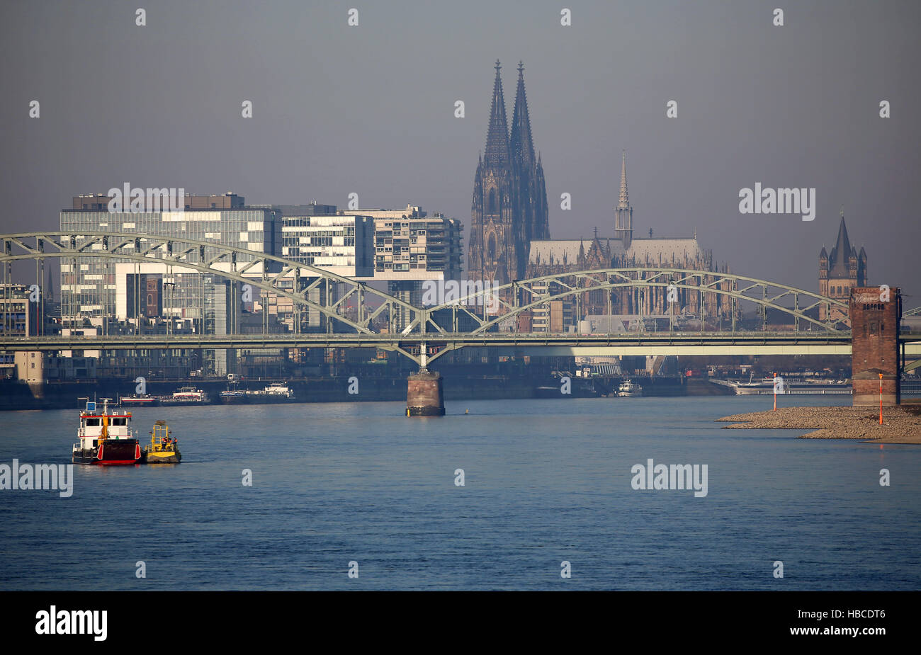 A ship anchors on Rhine river in front of the panorama with the ...