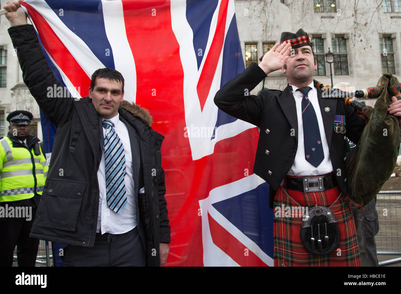 London, UK. 5th Dec, 2016. Pro-Leave supporters carry Union Flags as ...