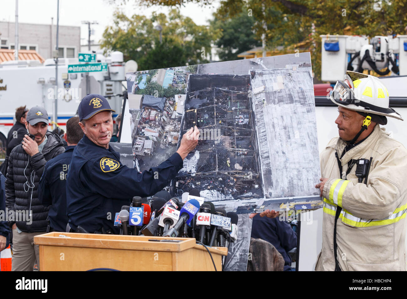 Oakland, USA. 05th Dec, 2016. and Oakland Fire Deputy Chief Darin White ...