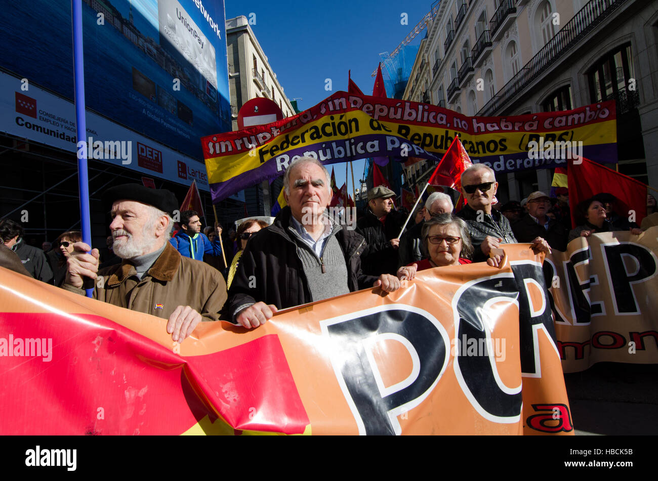 Madrid, Spain. 6th December, 2016. People holding the main banner of ...