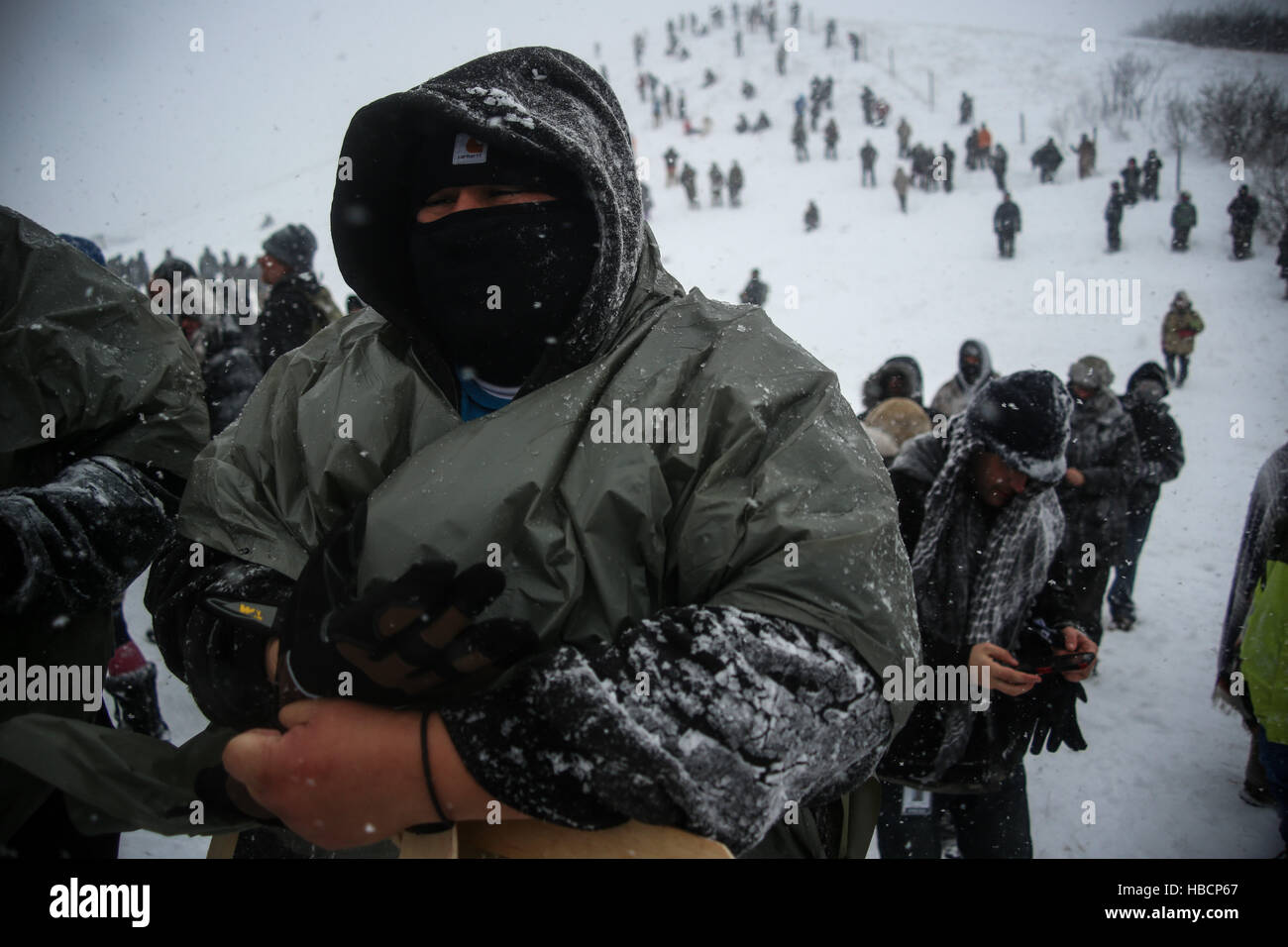 Cannon Ball, North Dakota, USA. 5th Dec, 2016. A water protector stands ...