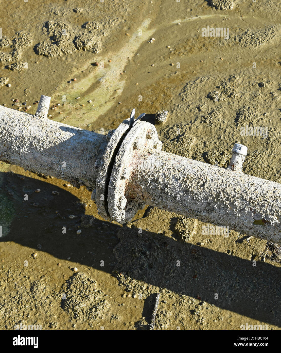 Dirty metal water pipe outdoors Stock Photo - Alamy