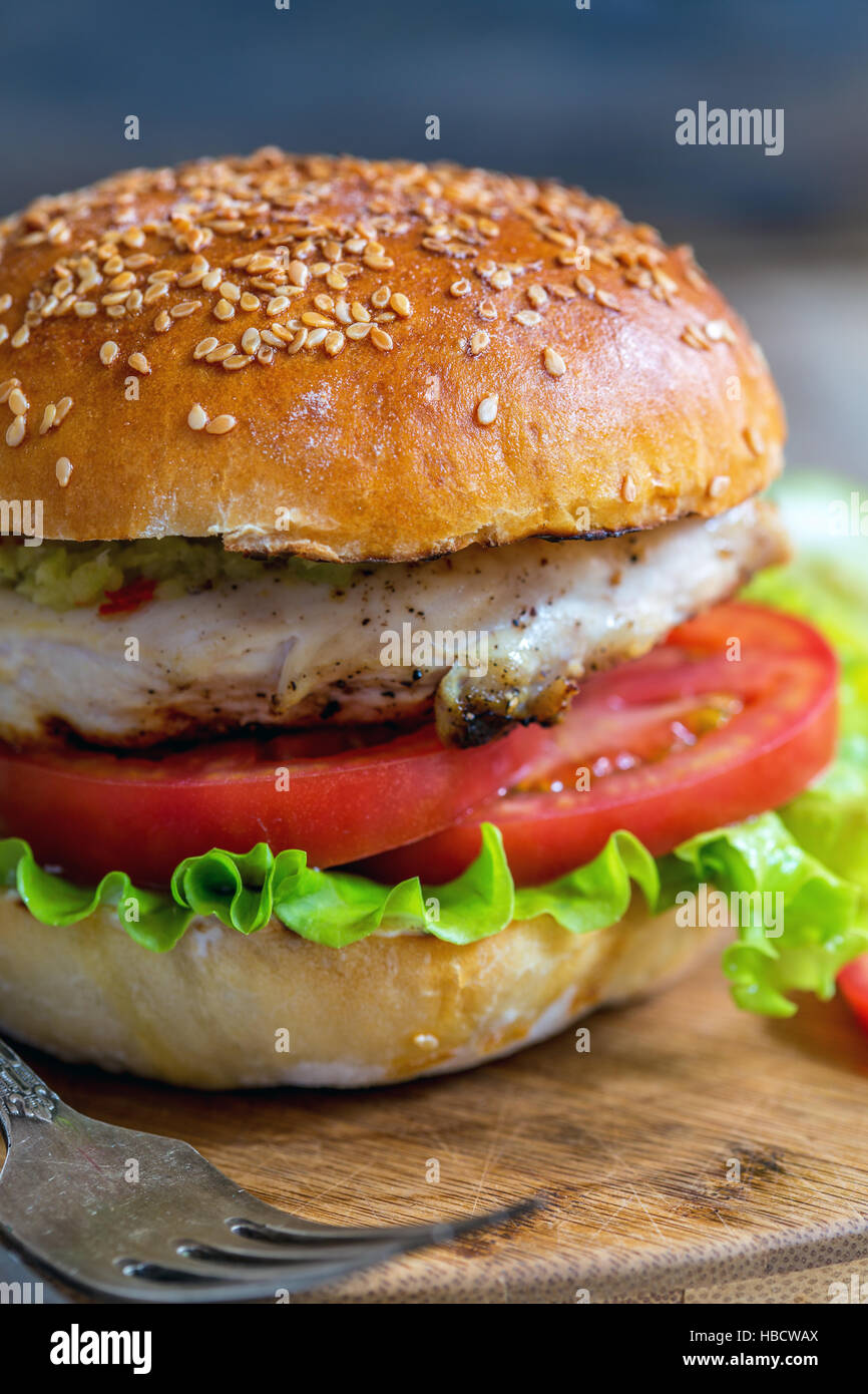 Burger with salad and chicken Stock Photo - Alamy