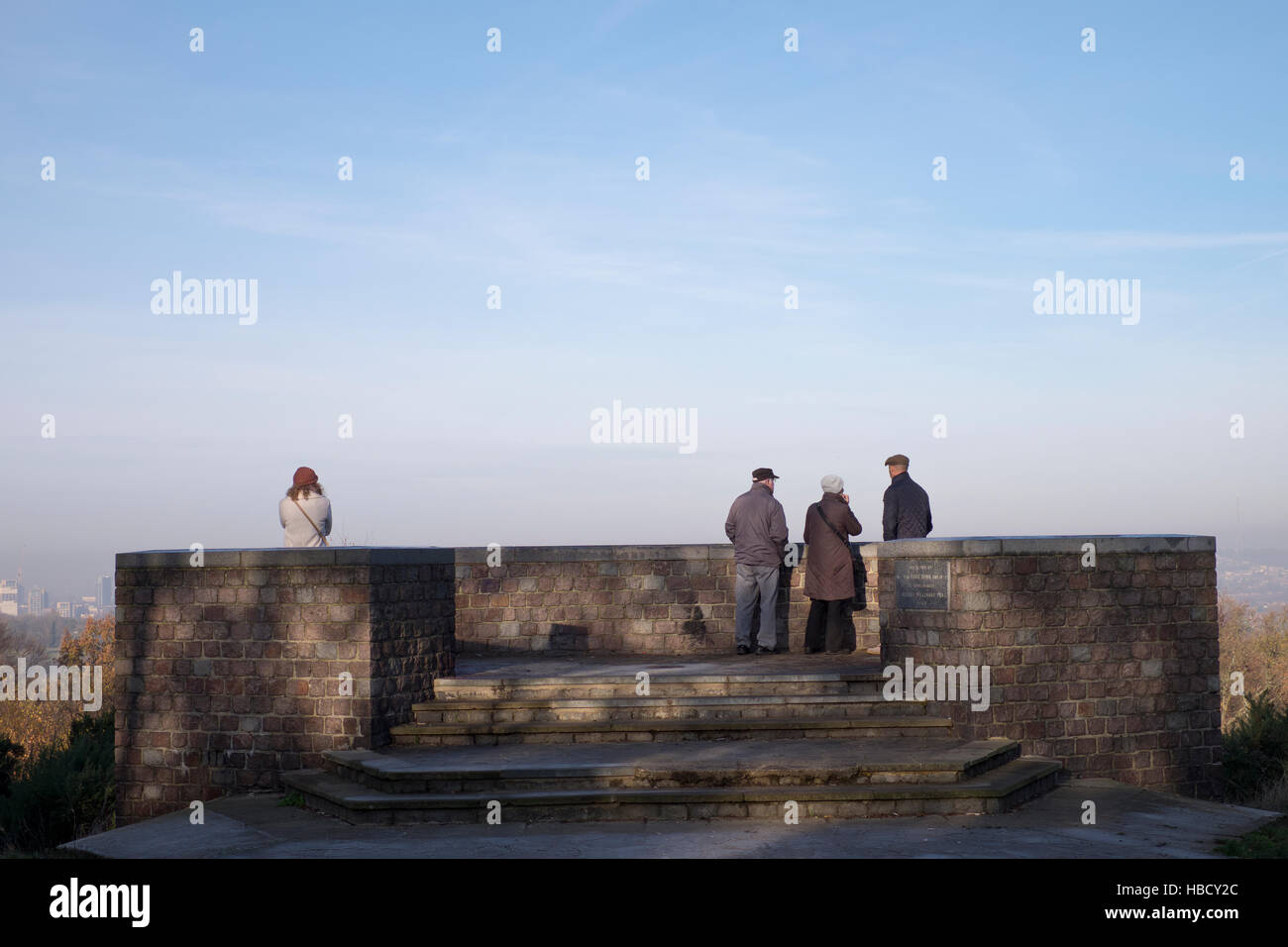 family looking at the Croydon skyline in winter from Addington Hills ...