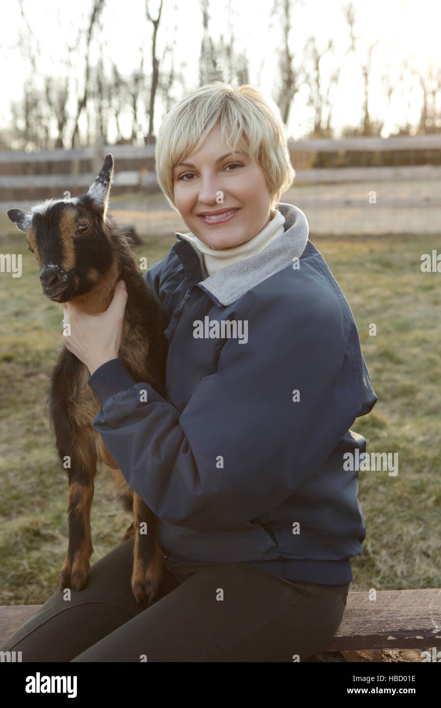 Woman with goat hi-res stock photography and images - Alamy