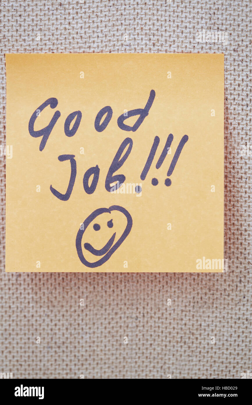 Good job written on a sticky note Stock Photo - Alamy