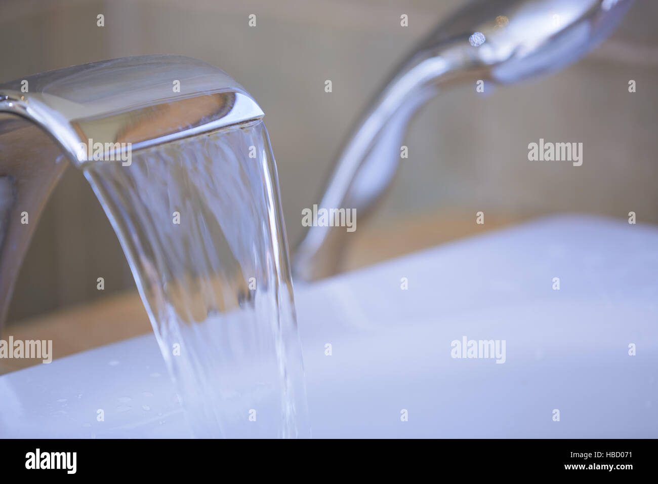 Tap with flowing water Stock Photo - Alamy