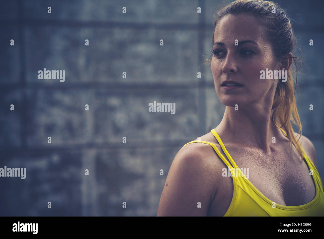 Woman wearing yellow vest hi-res stock photography and images - Alamy