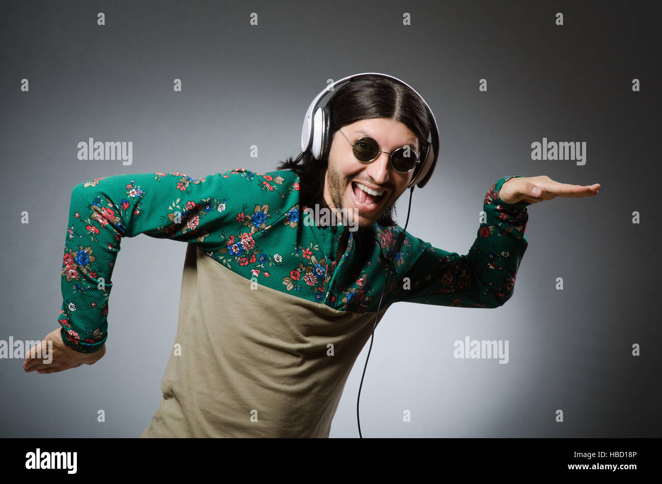 Young man with headphones in DJ concept Stock Photo - Alamy