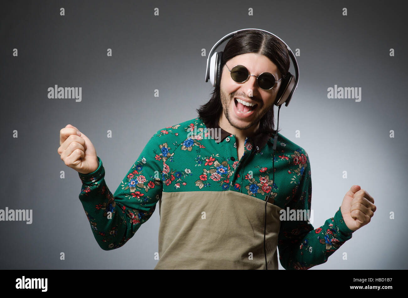 Young man with headphones in DJ concept Stock Photo - Alamy