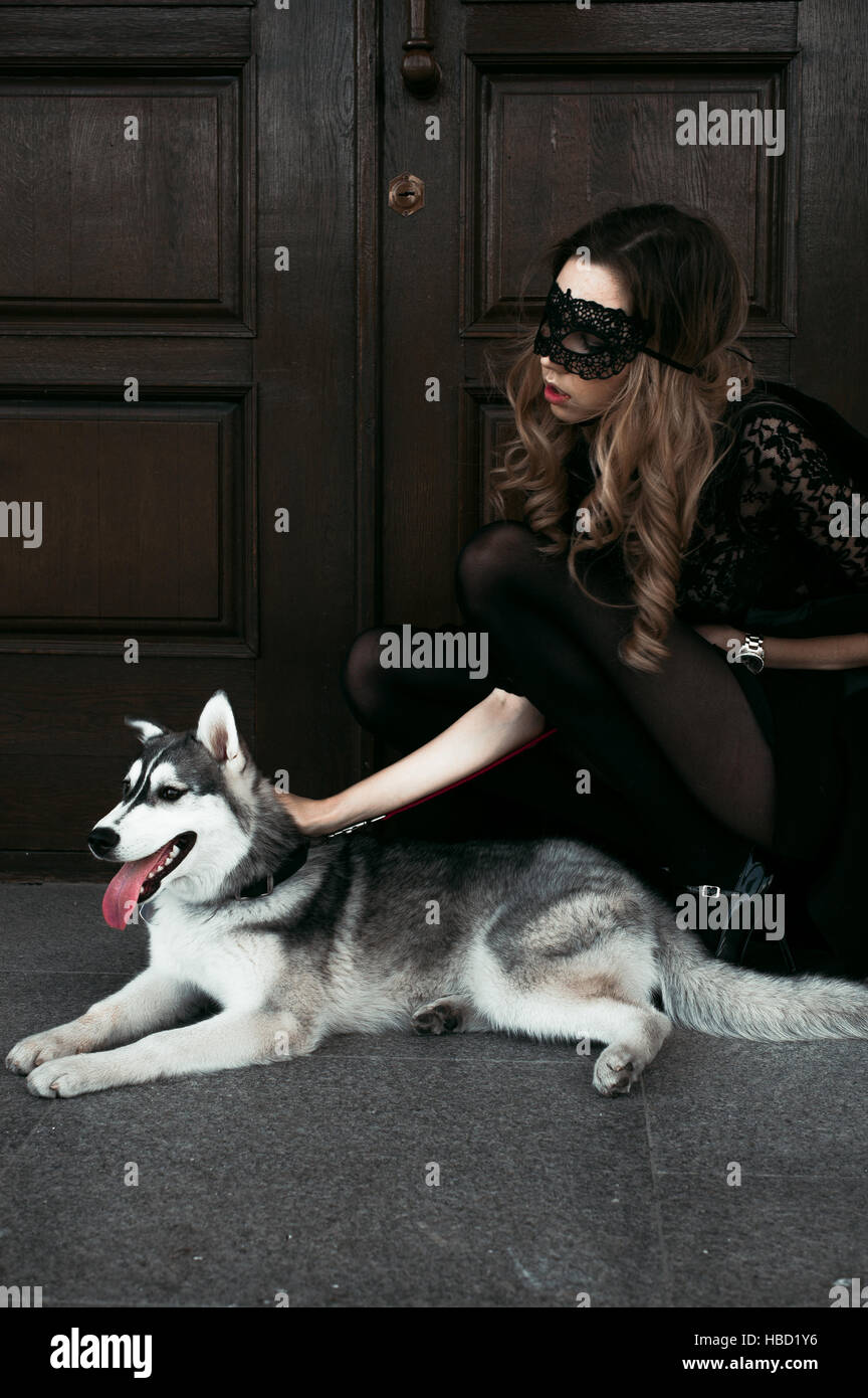 Girl in the park with a dog Husky. The girl with the siberian husky ...