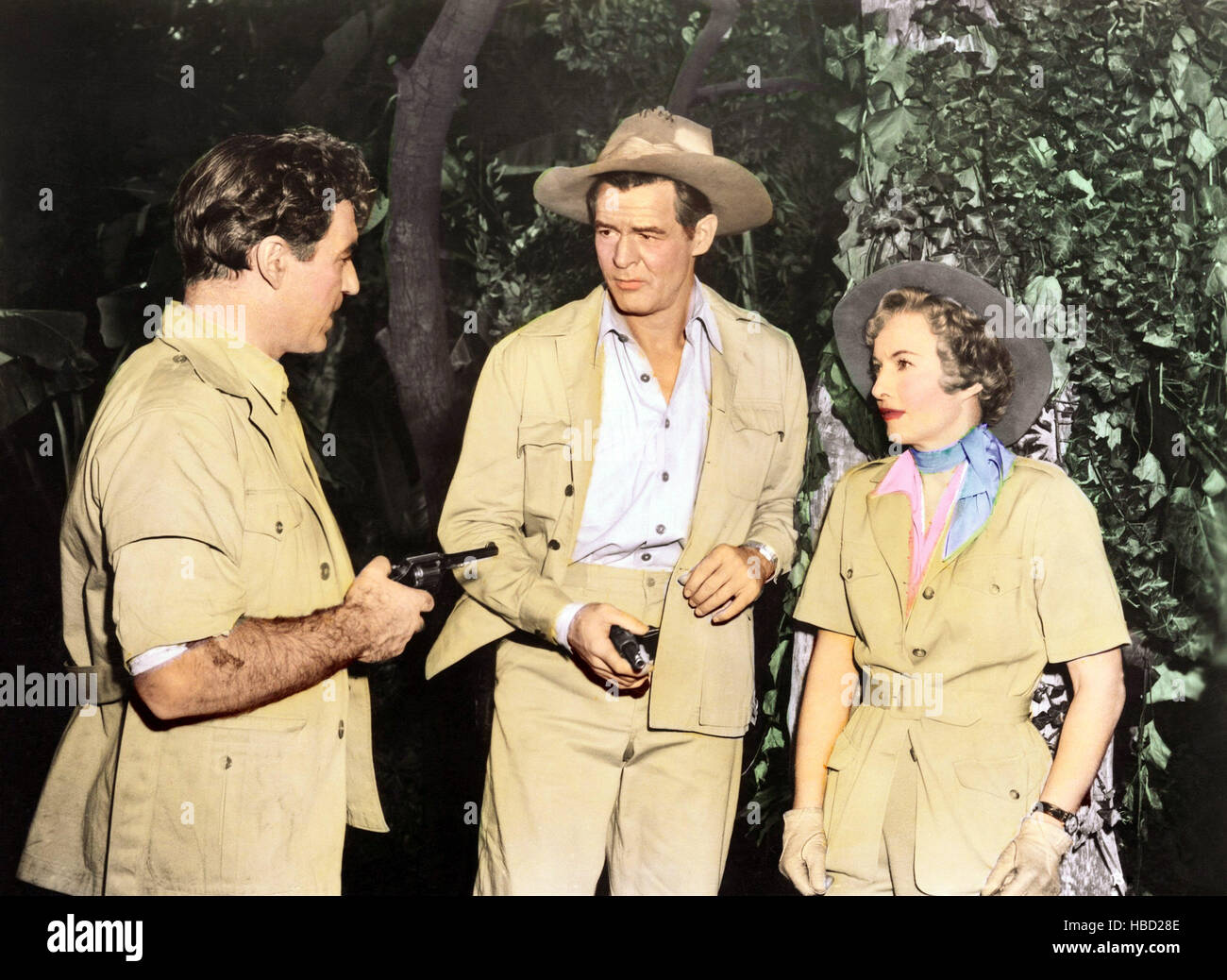 ESCAPE TO BURMA, from left: David Farrar, Robert Ryan, Barbara Stanwyck ...