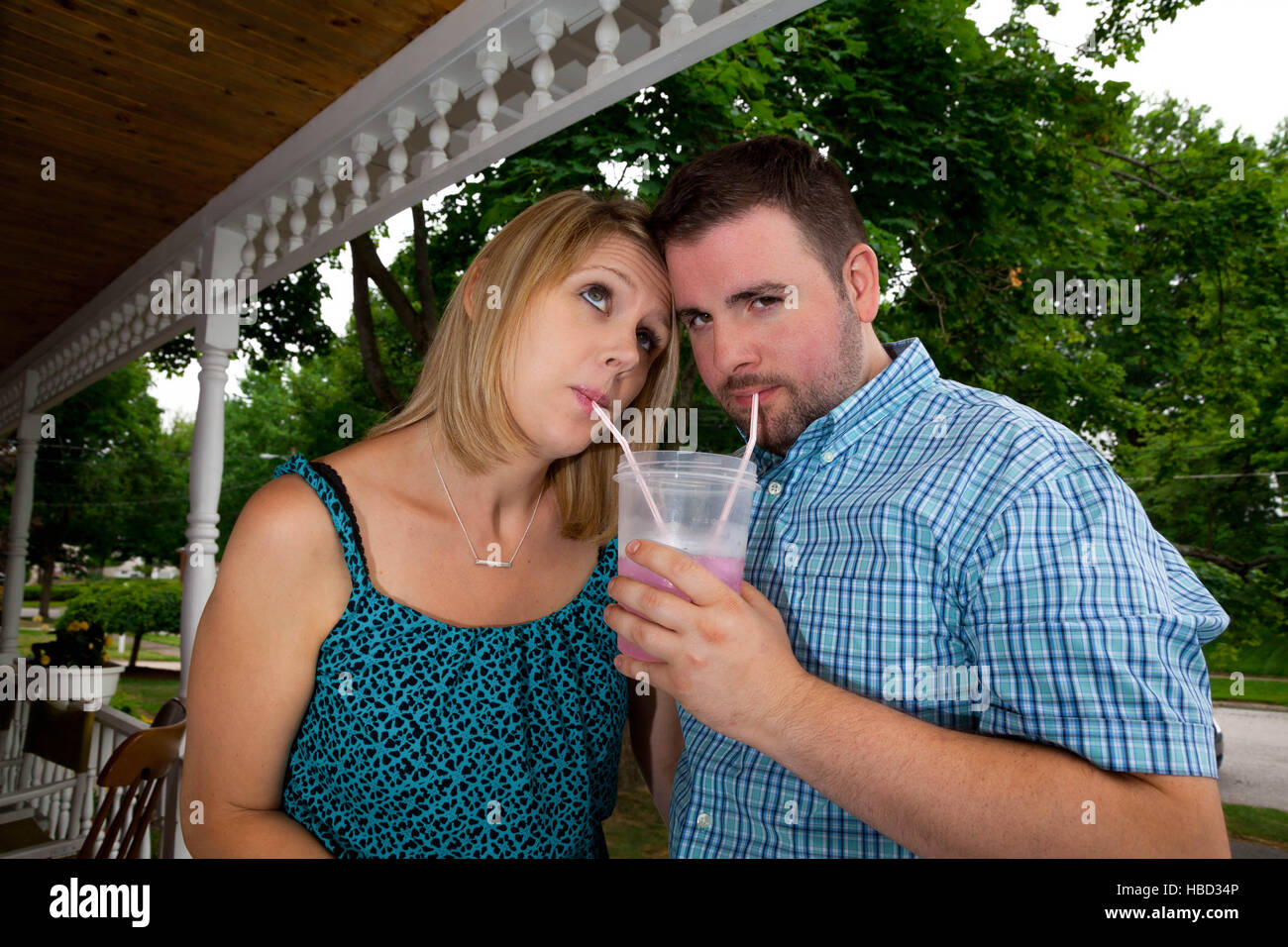 Friends sitting on a porch hi-res stock photography and images - Alamy