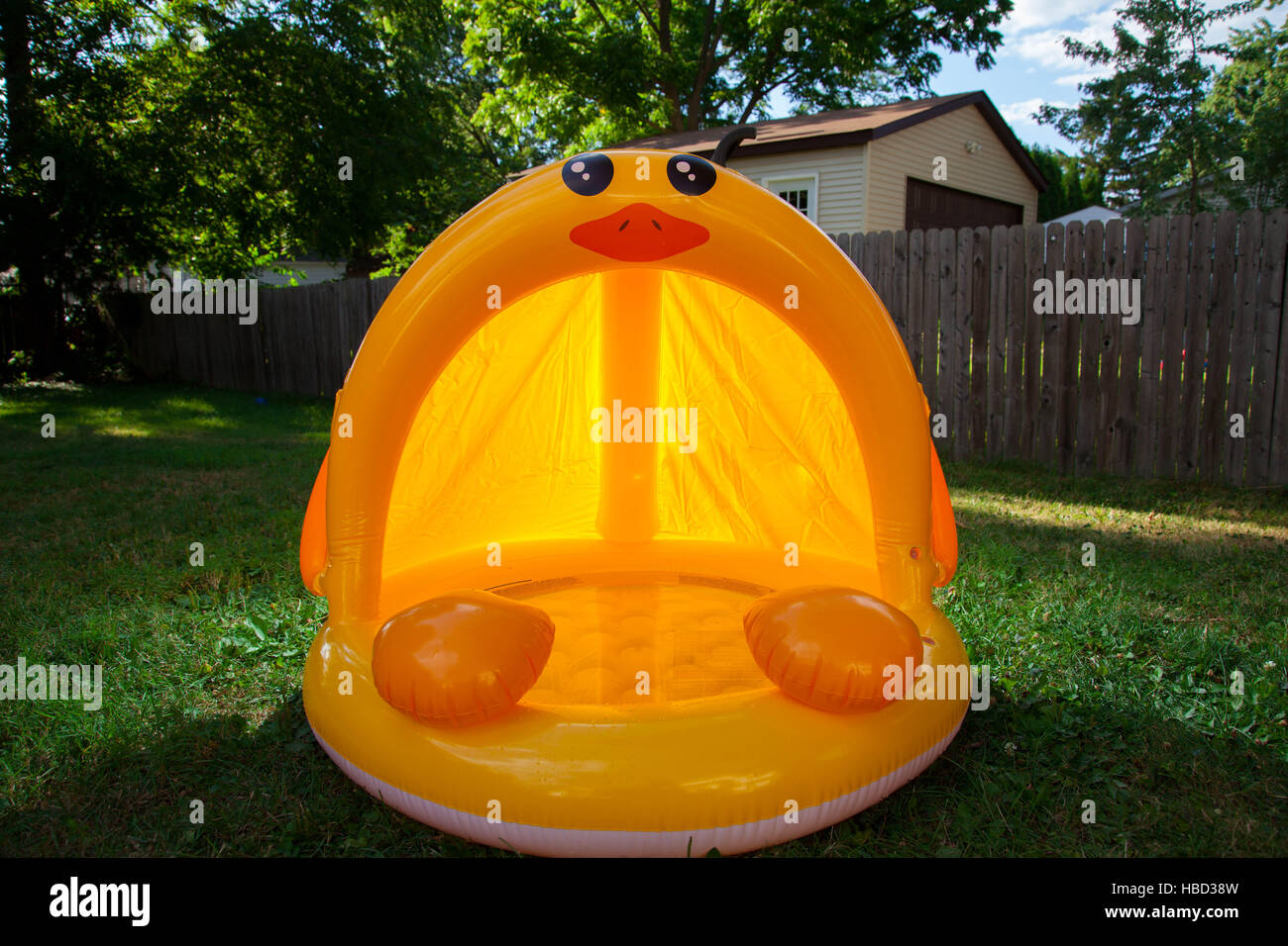 Yellow inflatable pool toy High Resolution Stock Photography and Images ...