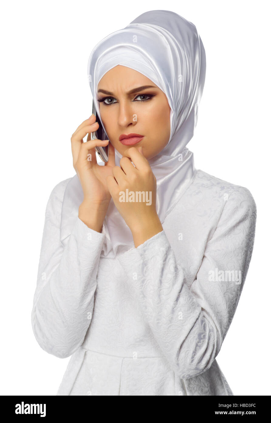 Muslim girl with mobile phone hi-res stock photography and images - Alamy