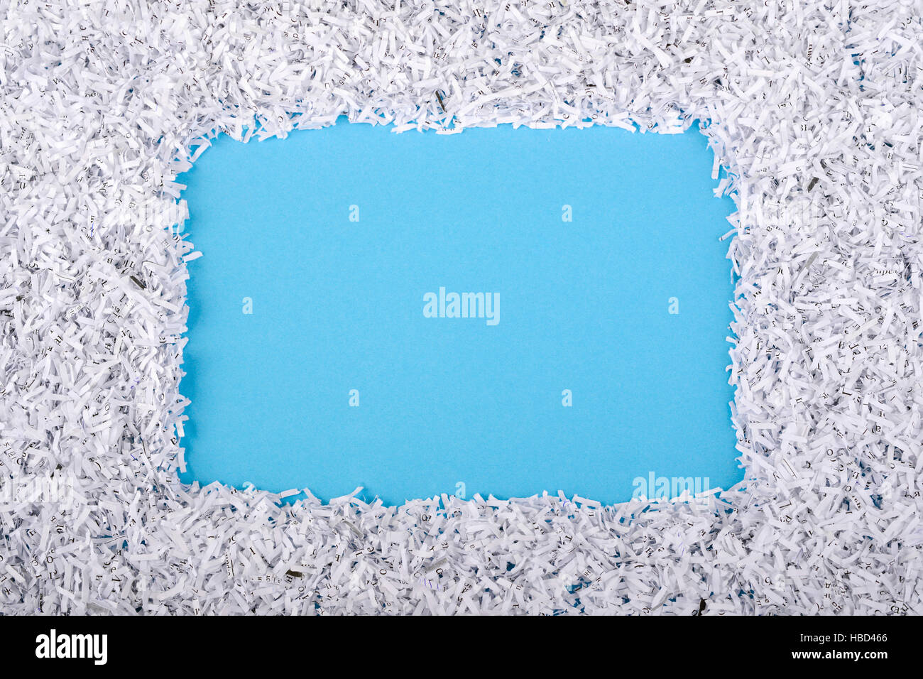 blue background with shredded paper frame around Stock Photo - Alamy