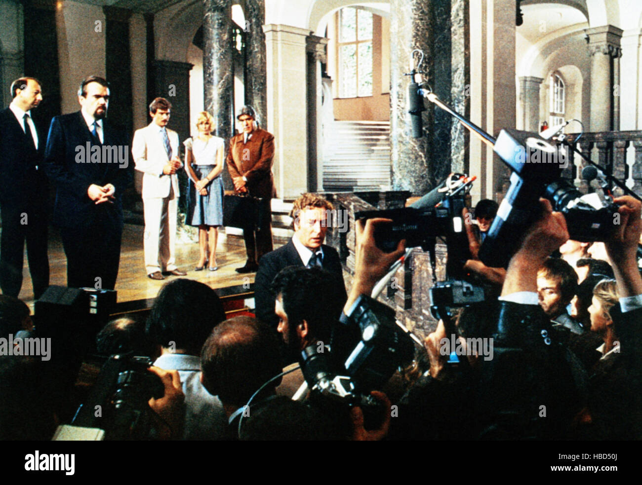 THE HOLCROFT COVENANT, Michael Caine (front), Michael Lonsdale (rear ...