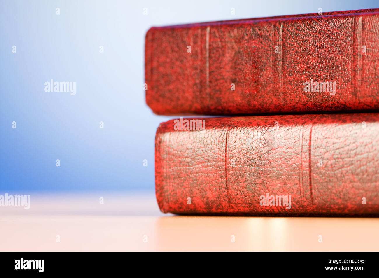 Education concept with red cover books Stock Photo - Alamy