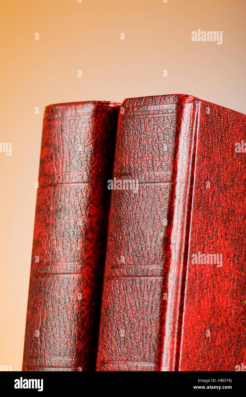 Education concept with red cover books Stock Photo - Alamy
