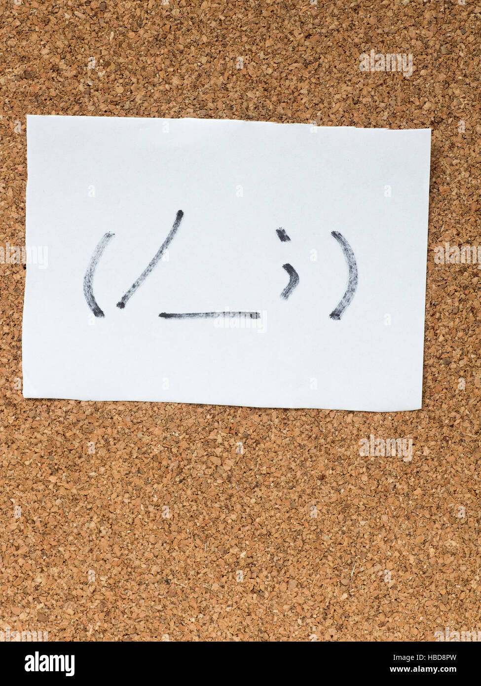 The series of Japanese emoticons called Kaomoji on the cork board ...