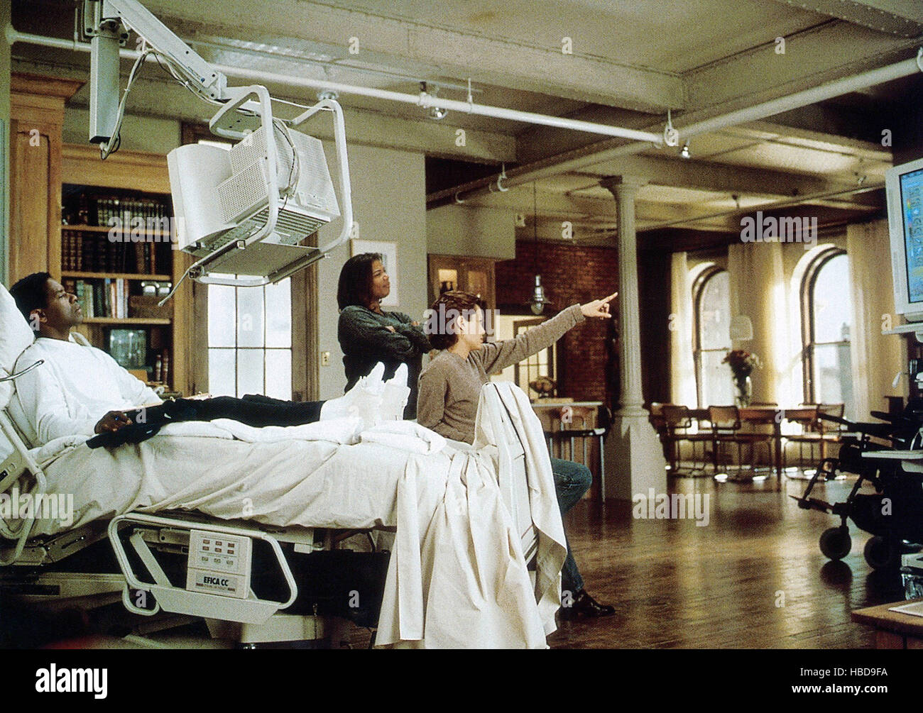 THE BONE COLLECTOR, Denzel Washington (in bed), Angelina Jolie ...