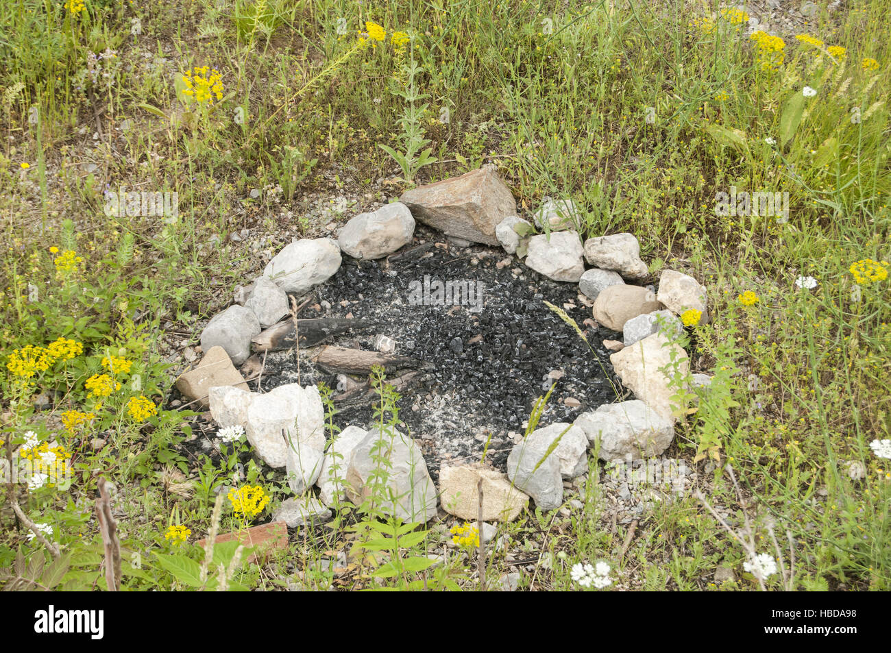 Unlit camp fireplace Stock Photo - Alamy