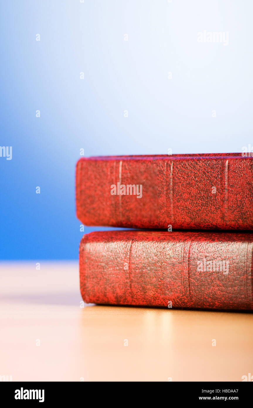 The education concept with red cover books Stock Photo - Alamy