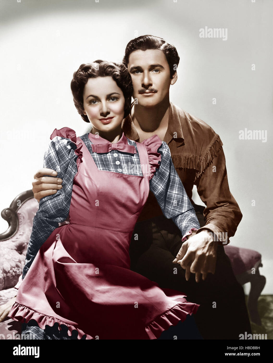 DODGE CITY, from left: Olivia de Havilland, Errol Flynn, 1939 Stock ...