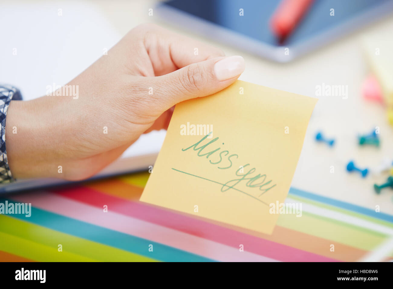 Miss you text on adhesive note Stock Photo - Alamy
