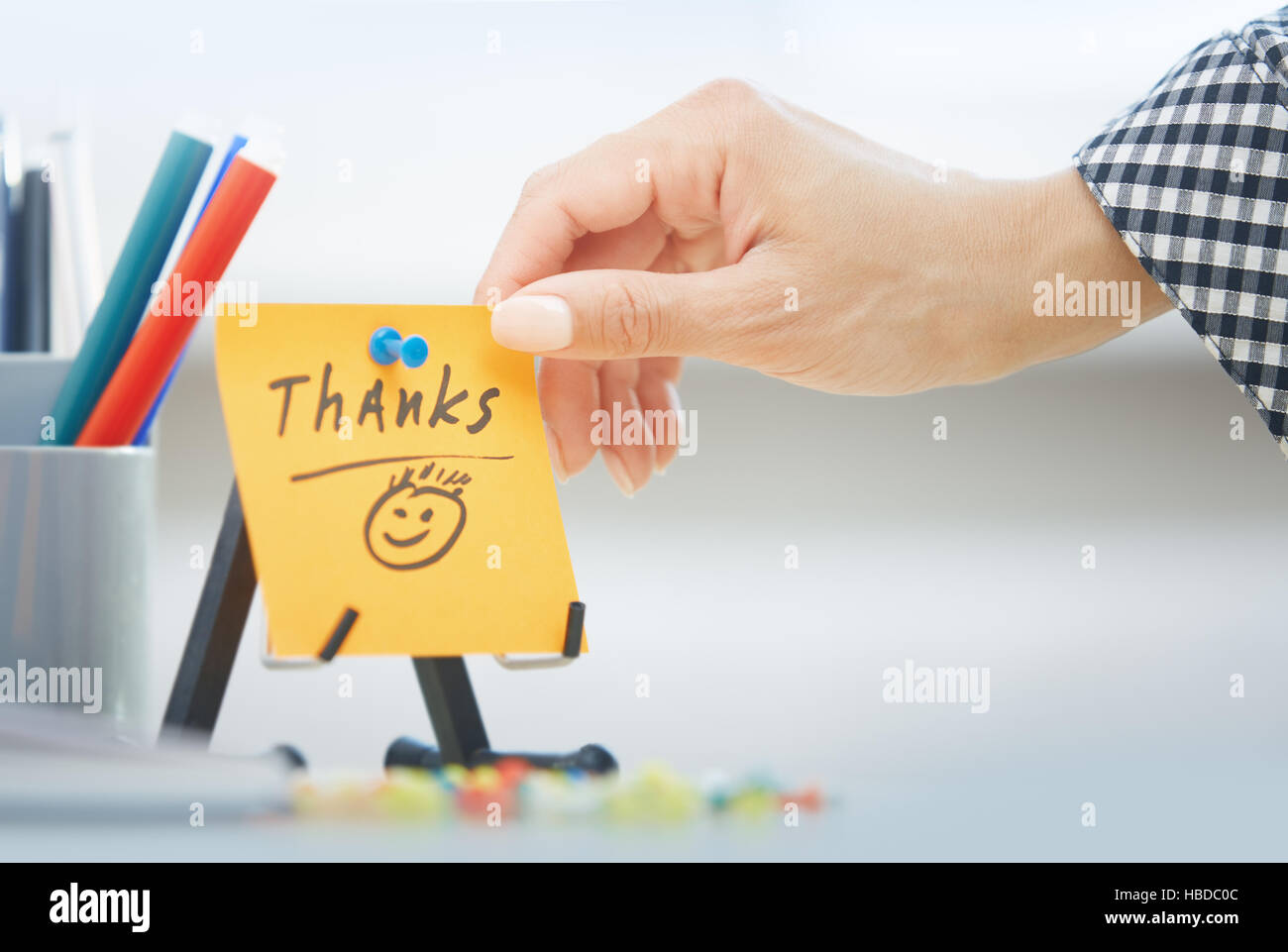 Thanks text on adhesive note Stock Photo - Alamy