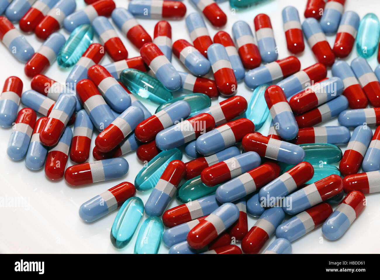 Assorted red-blue capsules Stock Photo - Alamy