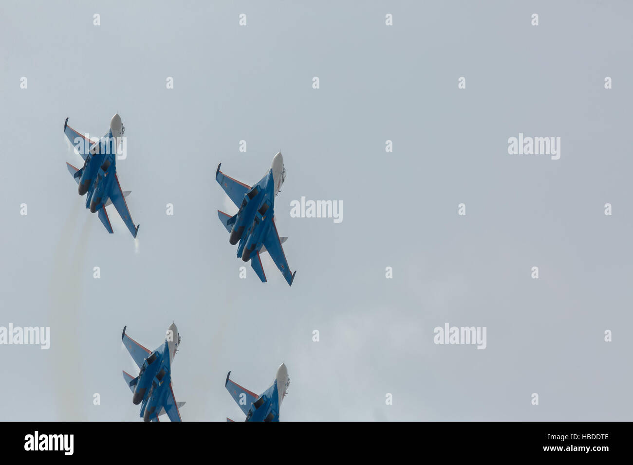Fighter Sukhoi Su-27 show aerobatics at an airshow Russian Knights ...