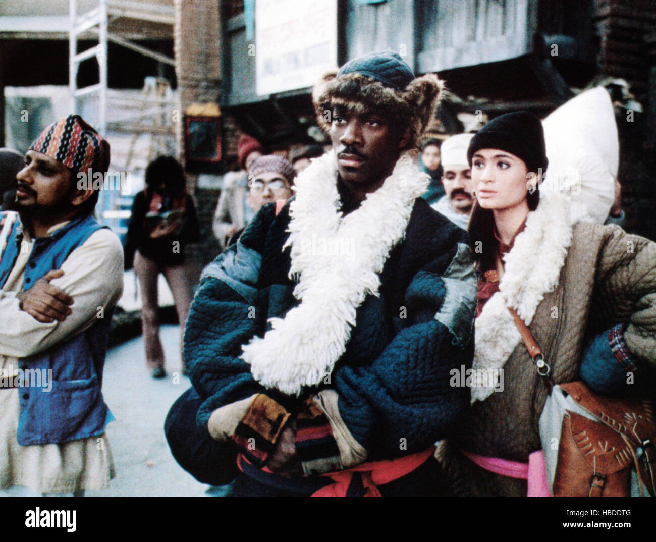 THE GOLDEN CHILD, in coats from left: Eddie Murphy, Charlotte Lewis ...