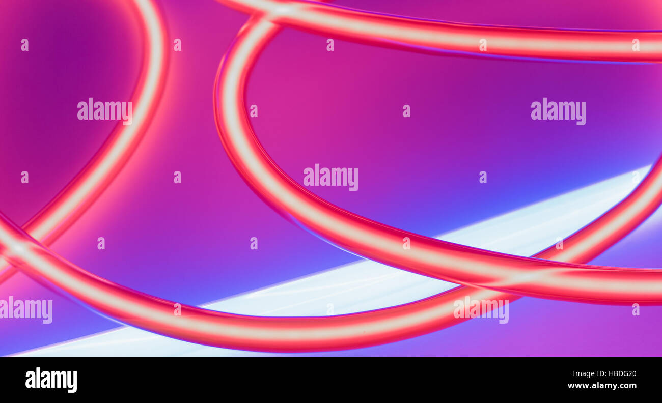 Glowing red neon light backdrop Stock Photo - Alamy