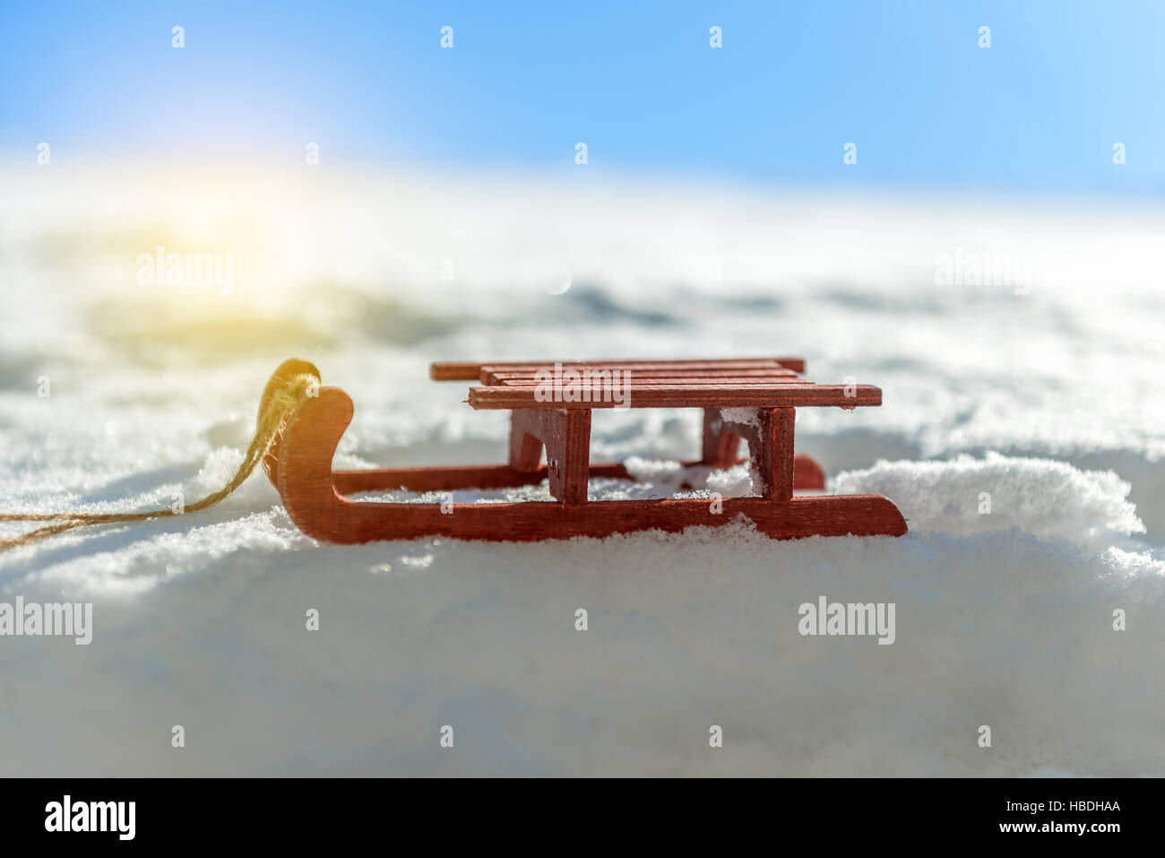 Red plastic sled hi-res stock photography and images - Alamy