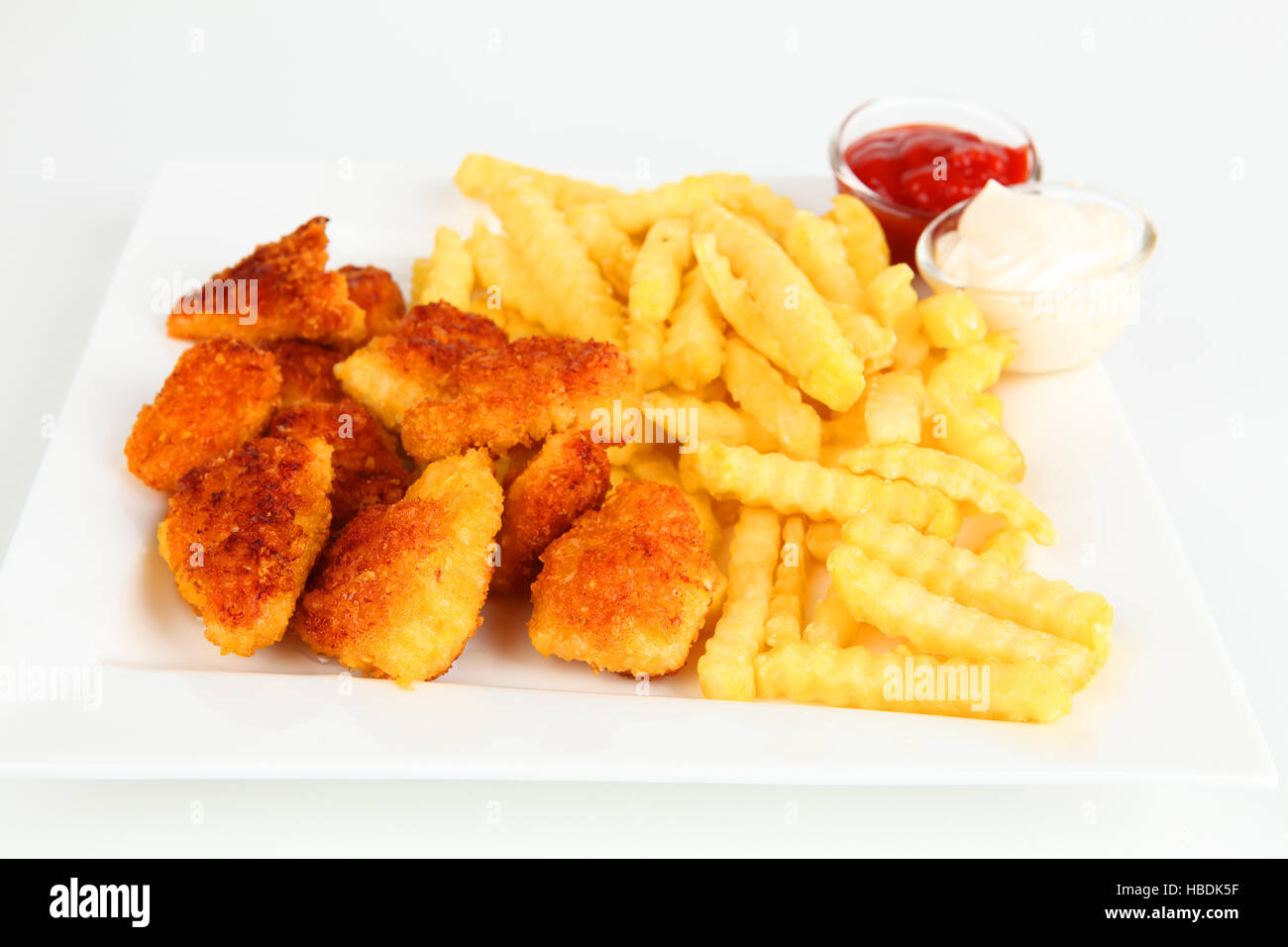 chicken nuggets and french fries Stock Photo - Alamy