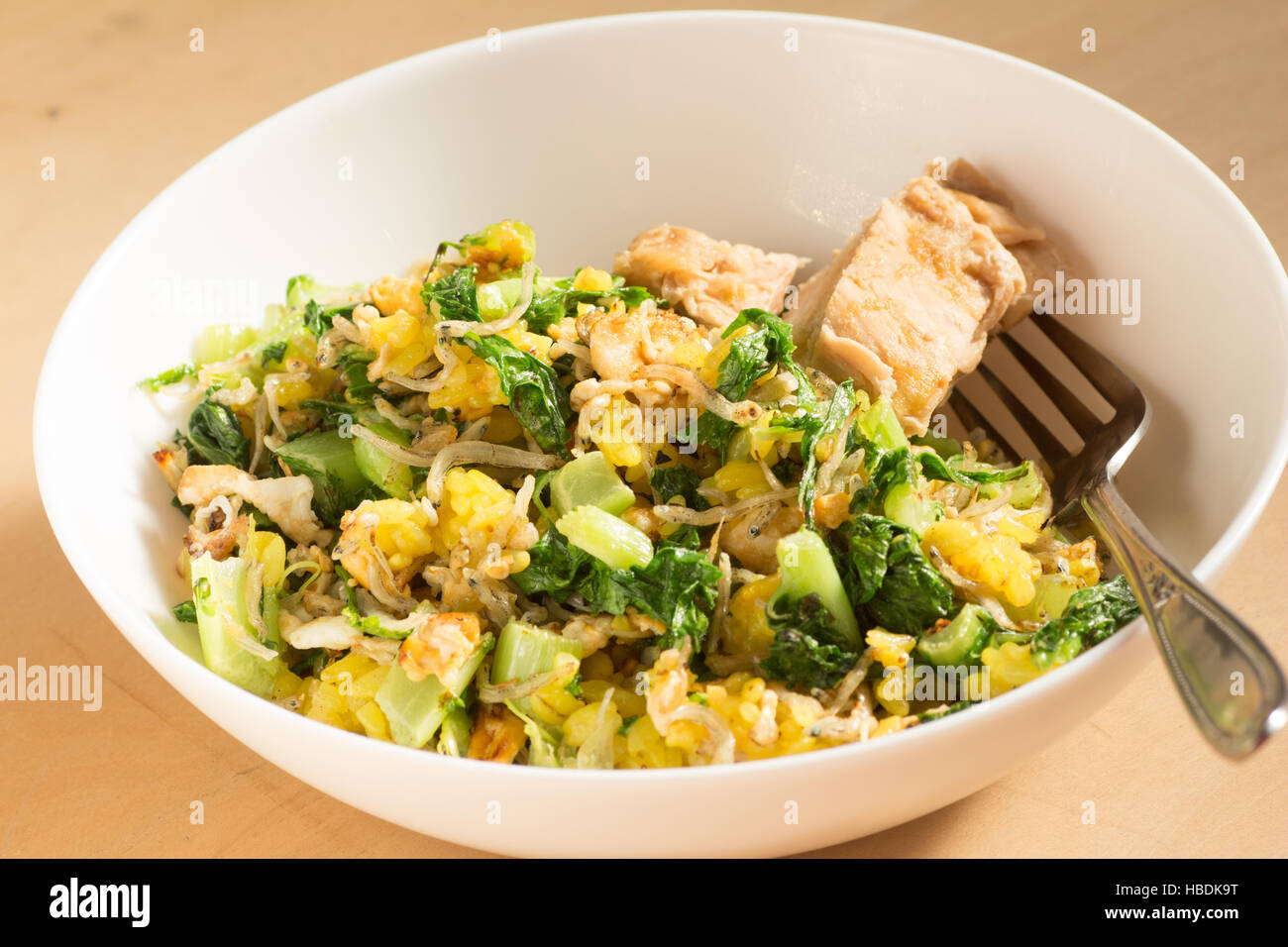 Japanese cuisine, fish and egg fried rice with grilled chicken in a ...