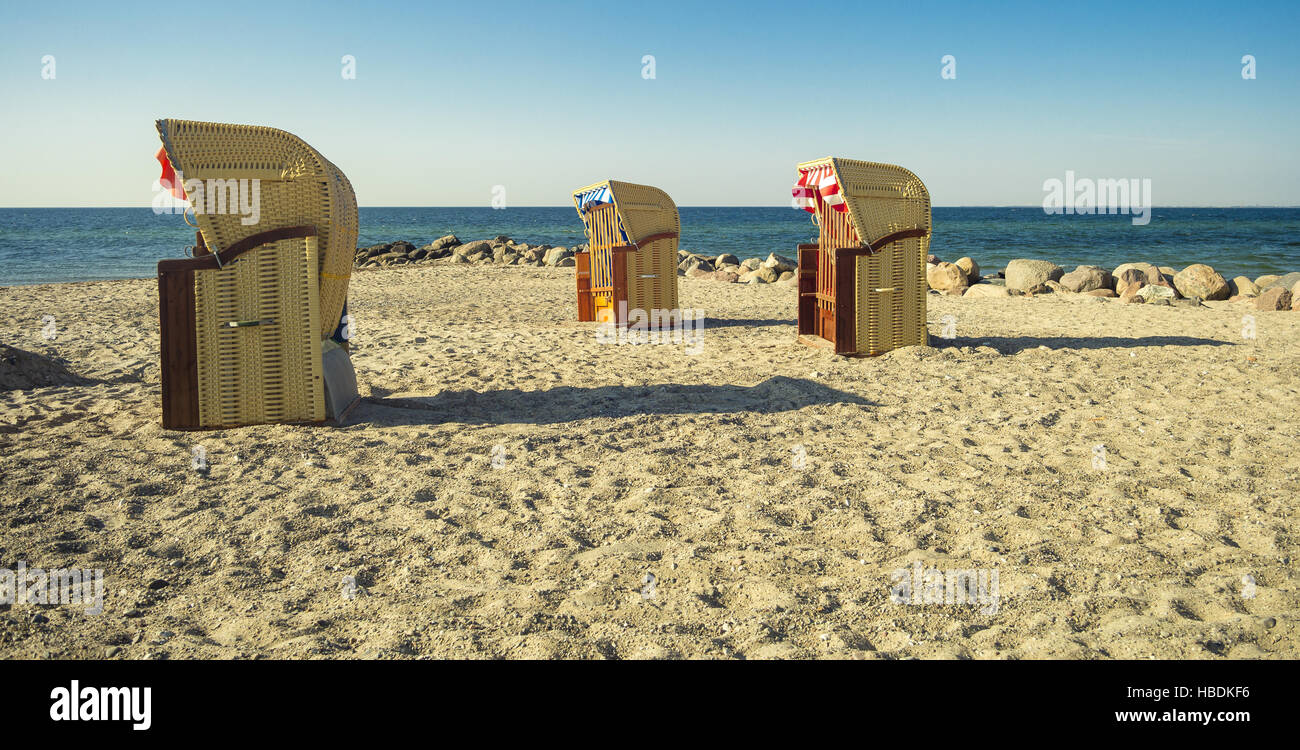 three beach chairs Stock Photo - Alamy