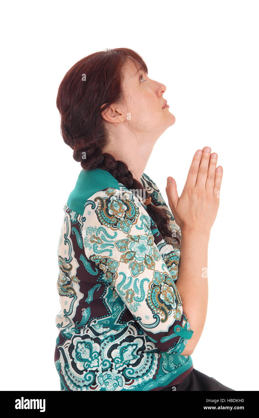 Pretty woman praying Stock Photo - Alamy