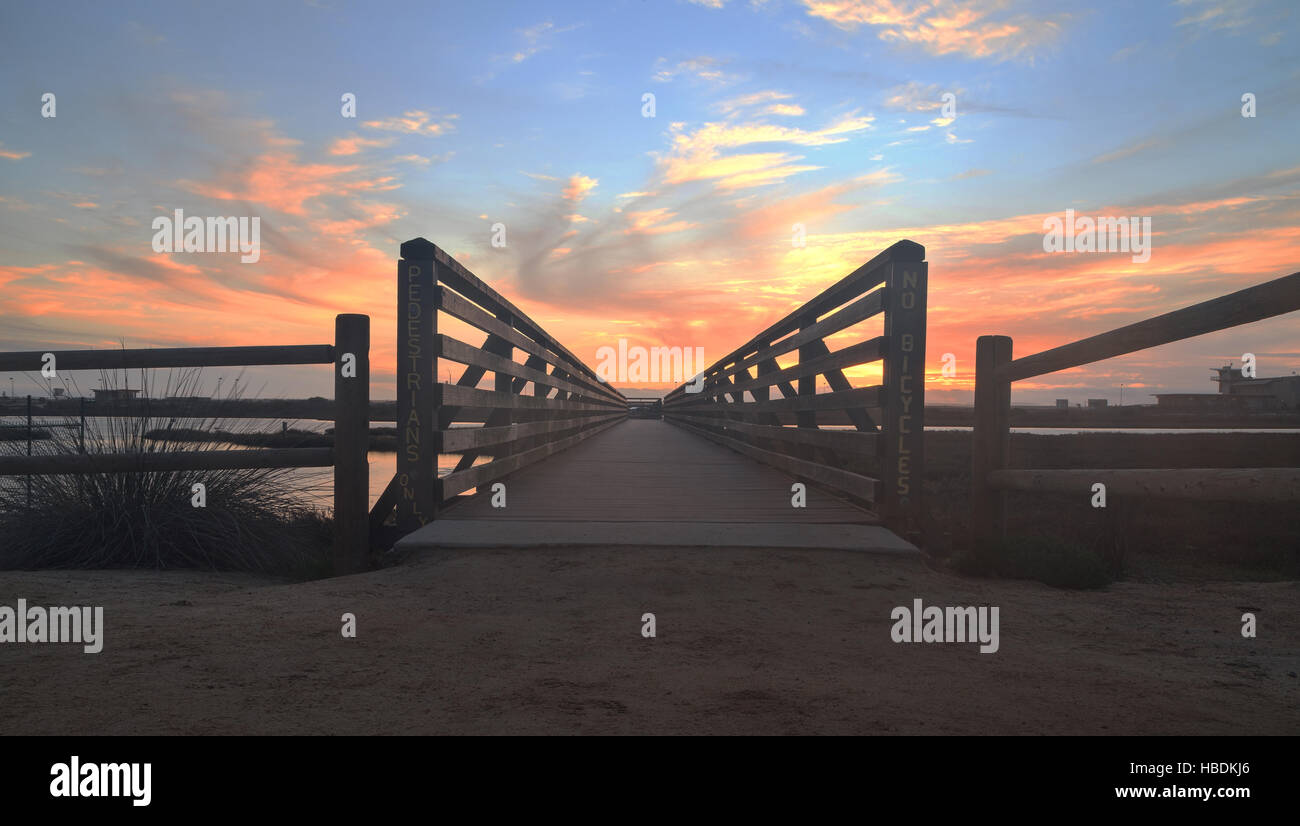 Wooden Boardwalk at sunset Stock Photo - Alamy