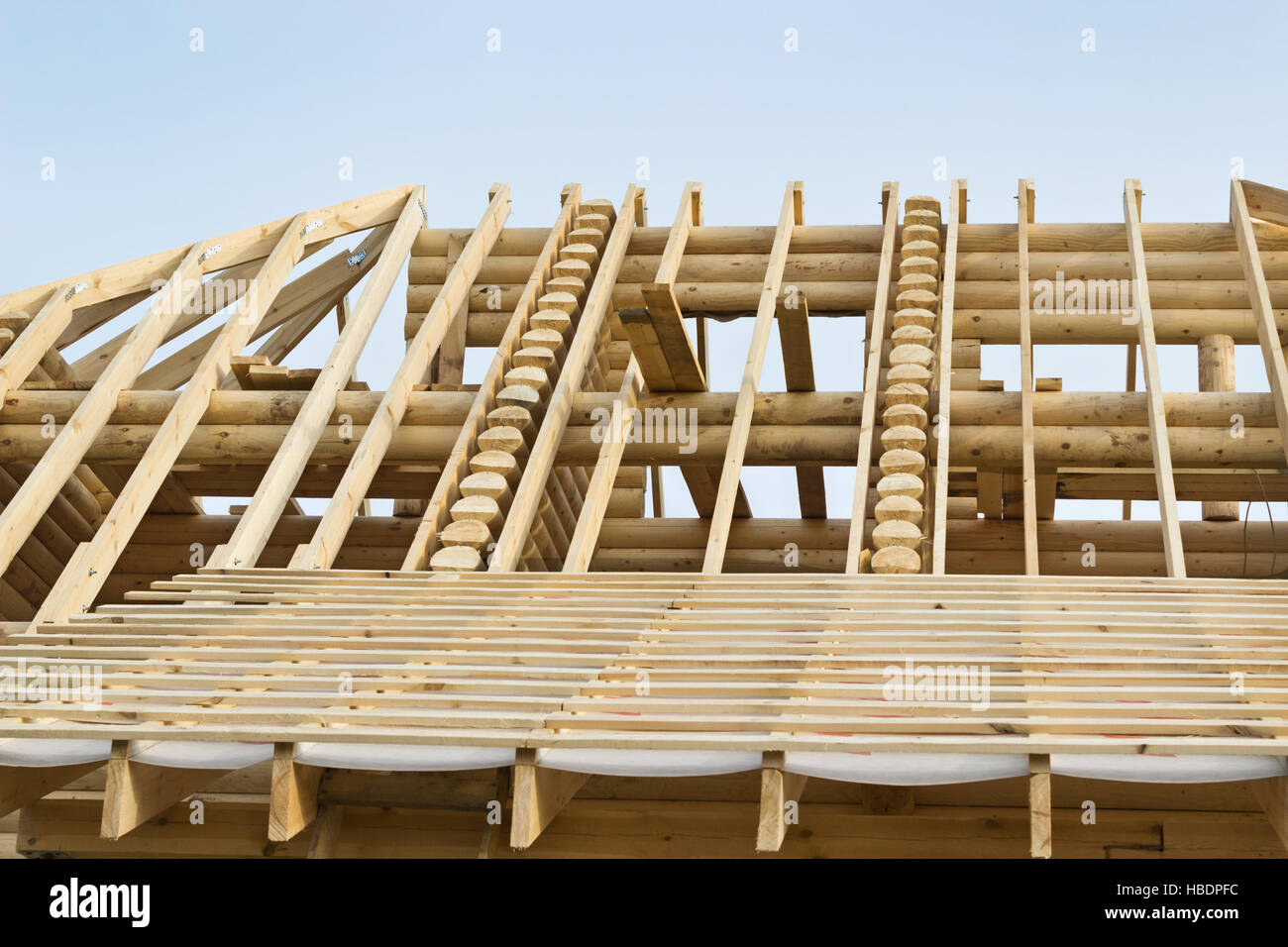 The wooden roof of new log houses Stock Photo - Alamy