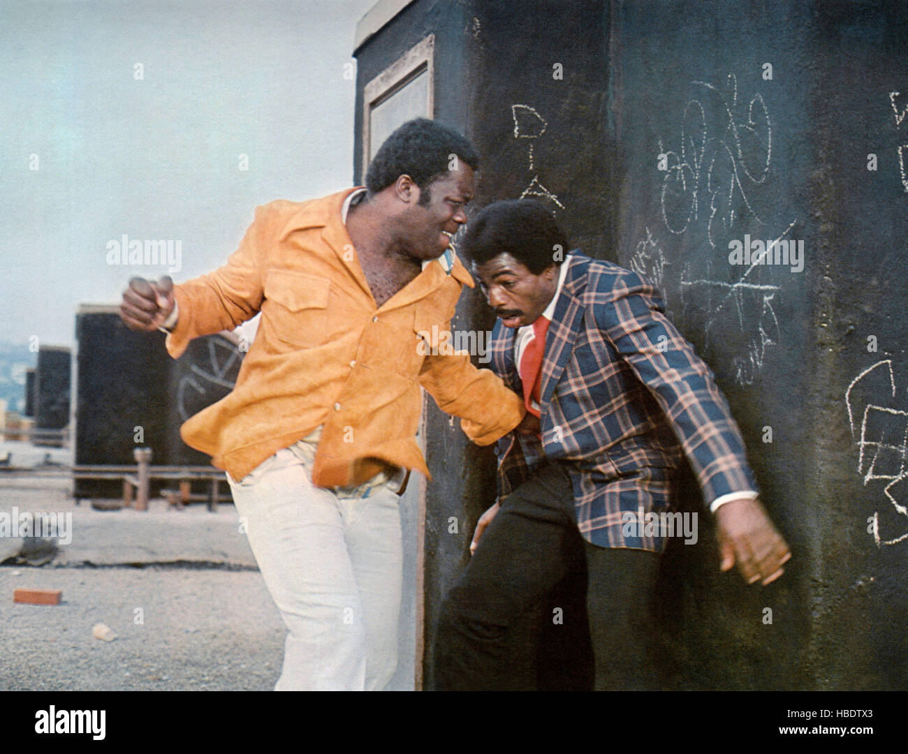FRIDAY FOSTER, from left: Yaphet Kotto, Carl Weathers, 1975 Stock Photo ...