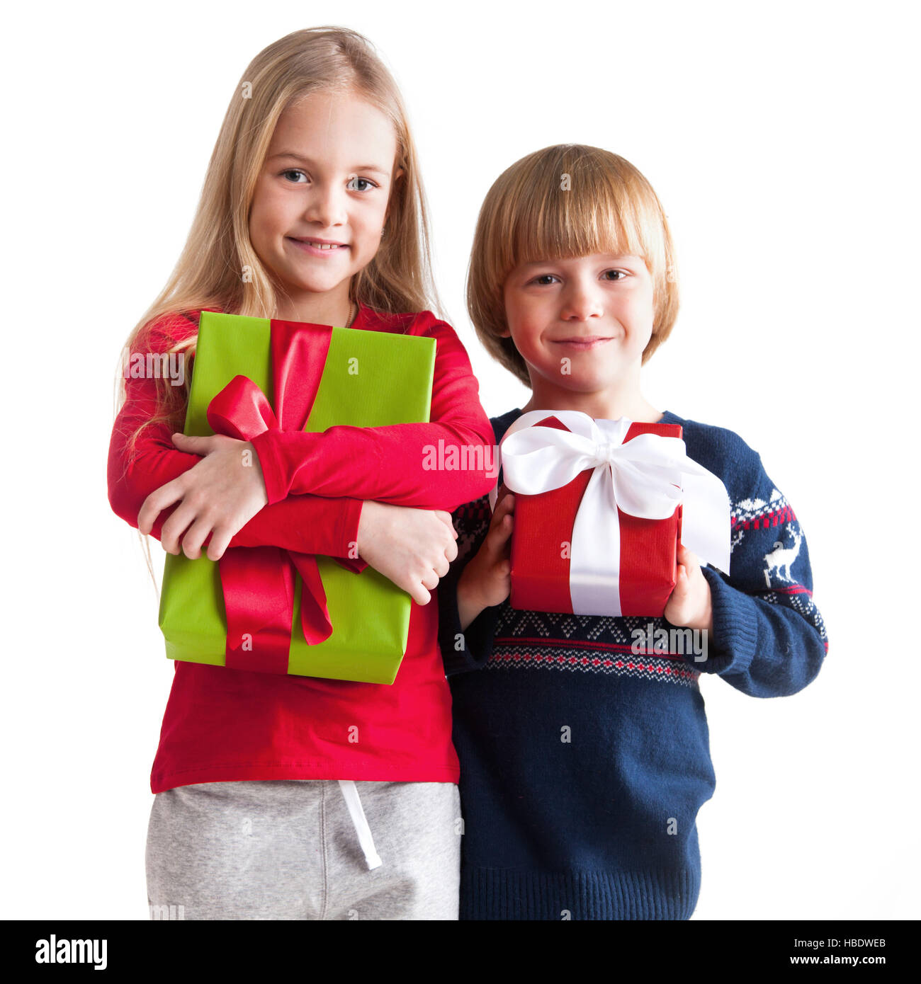 Smiling boy and girl with gifts isolated on white Stock Photo - Alamy