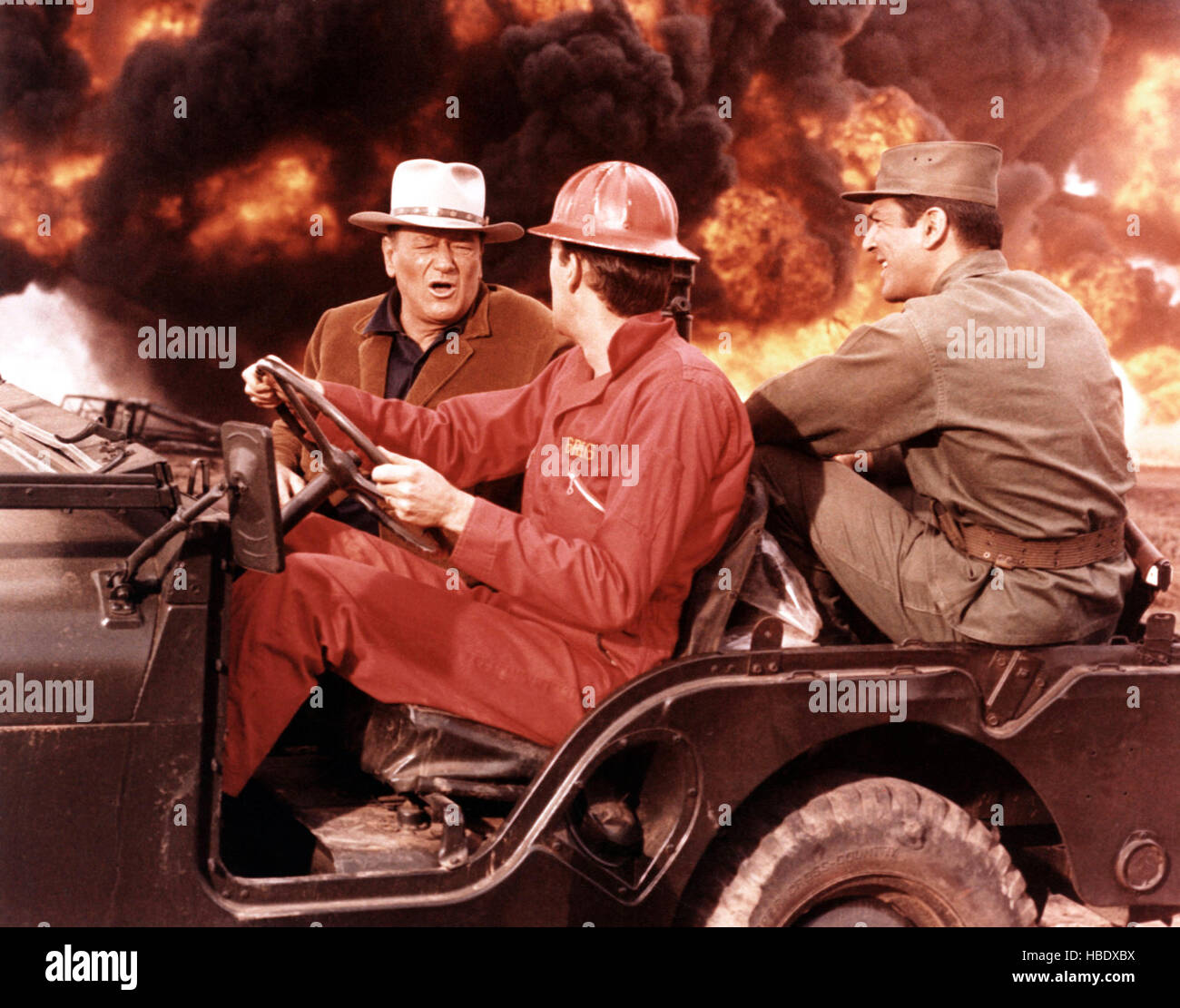 HELLFIGHTERS, from left: John Wayne, Jim Hutton (hard hat), Edmund ...