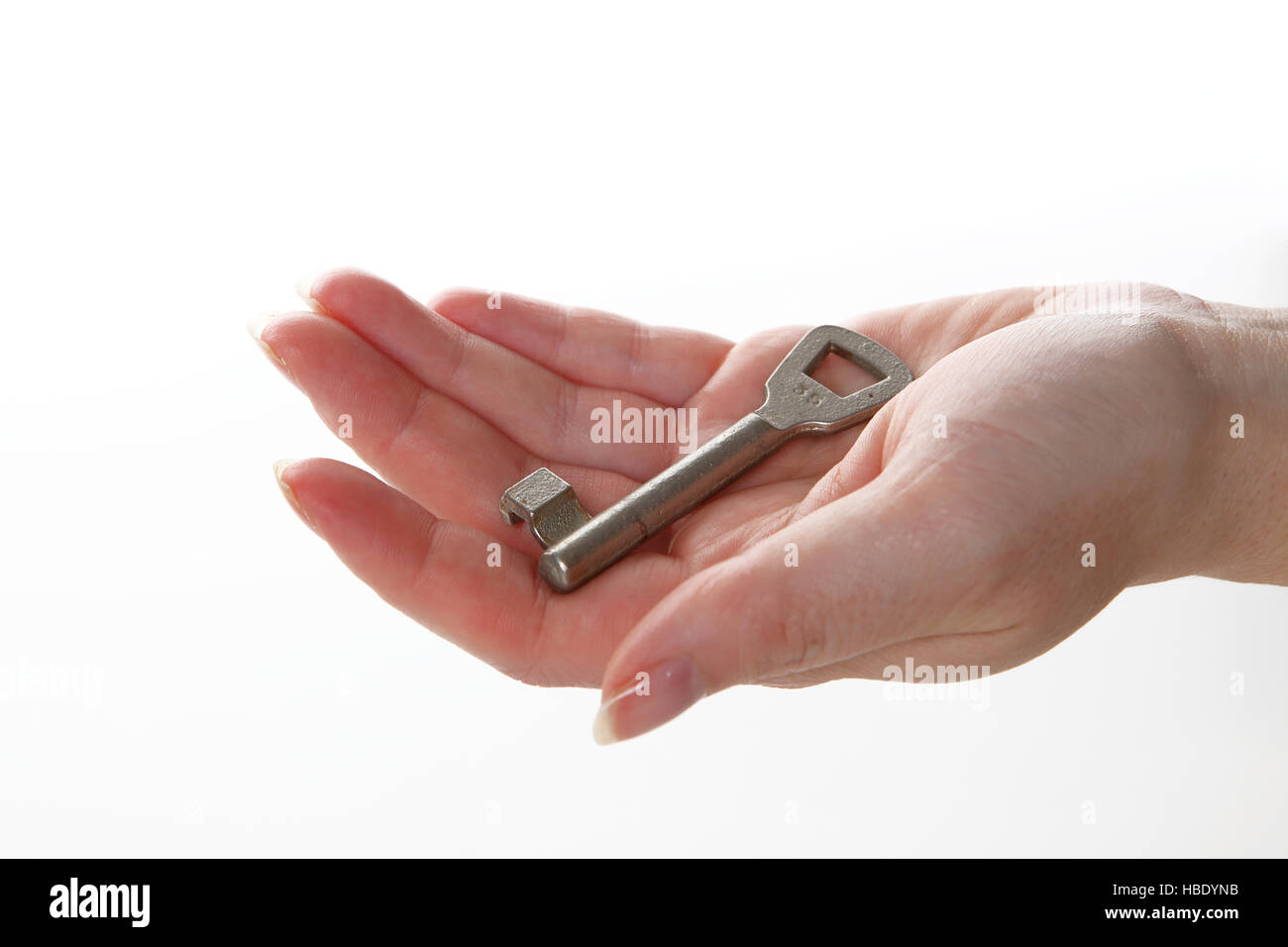 hand with key Stock Photo - Alamy