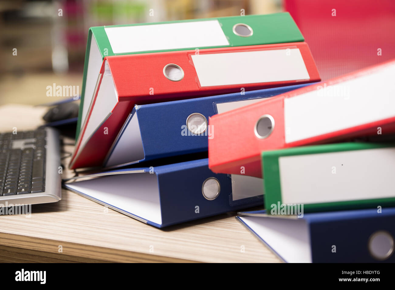 Stacks of office binders on desk Stock Photo - Alamy
