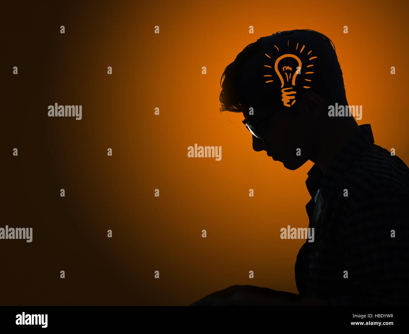 Bright idea concept with light bulb and man Stock Photo - Alamy